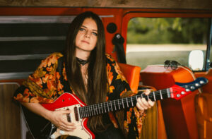 Singer Songwriter Arielle talks music and Printify merch