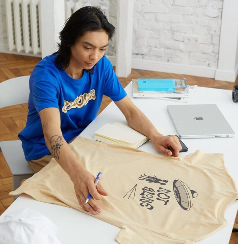 Make and sell custom all-over-print hoodies with Printify